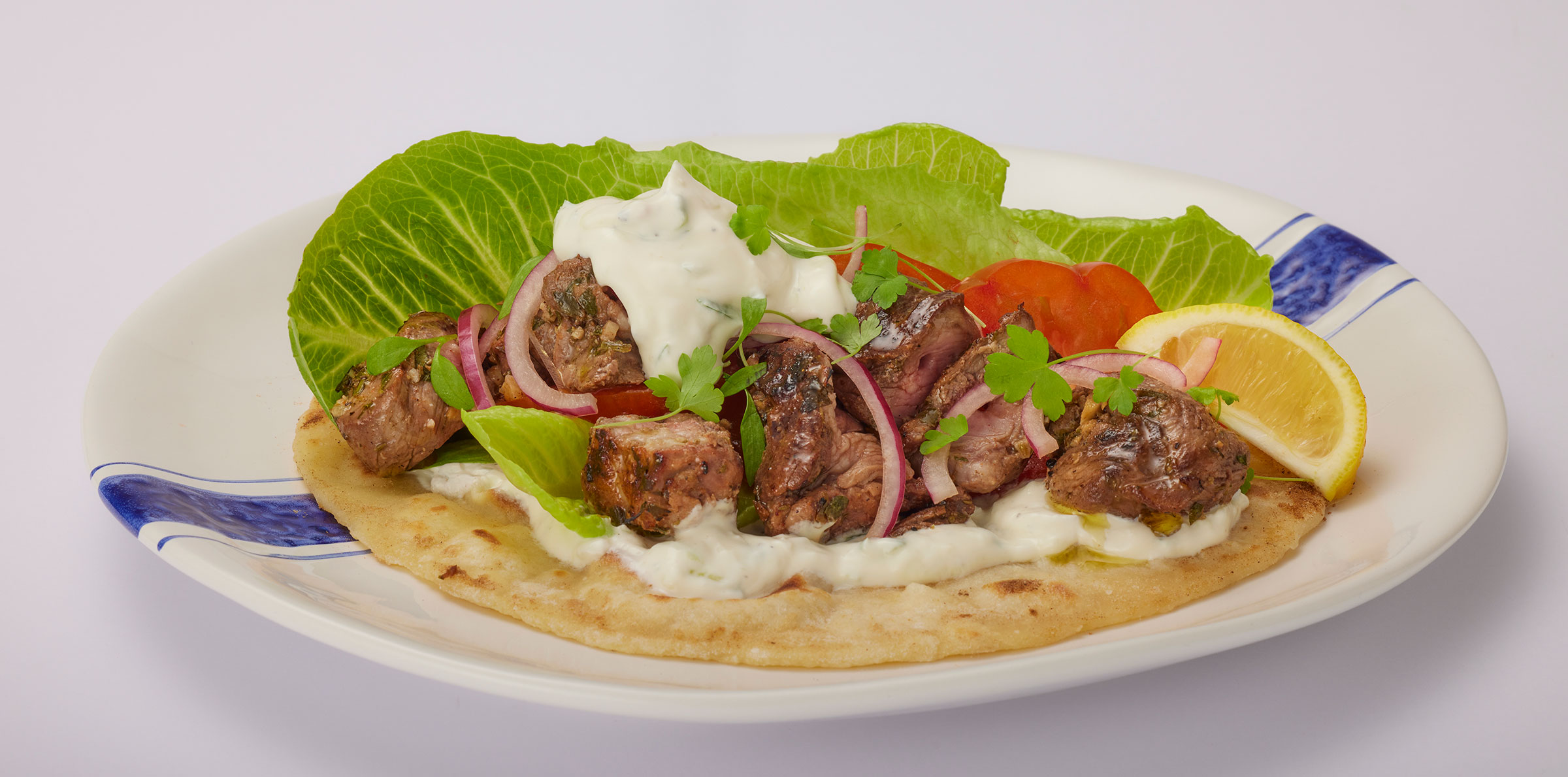 Succulent Lamb Souvas with Garlic Yogurt Sauce - Farmers Union